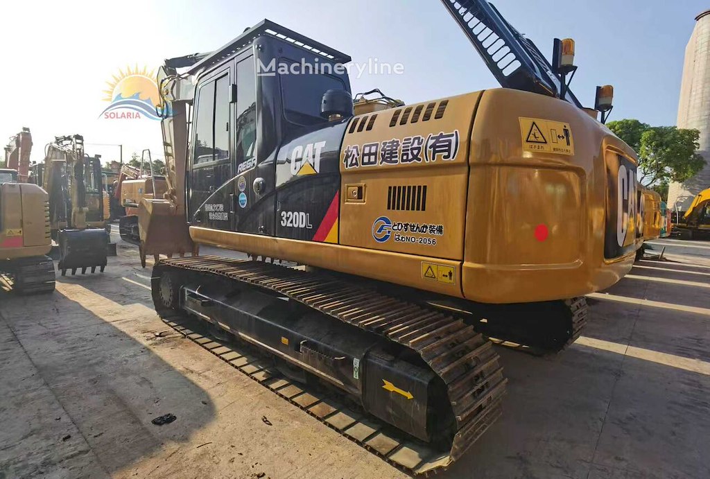 Caterpillar 320DL bager guseničar