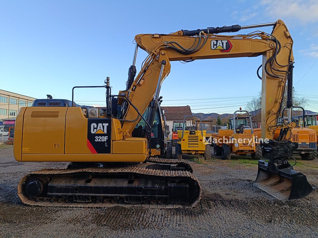 Caterpillar 320FL bager guseničar