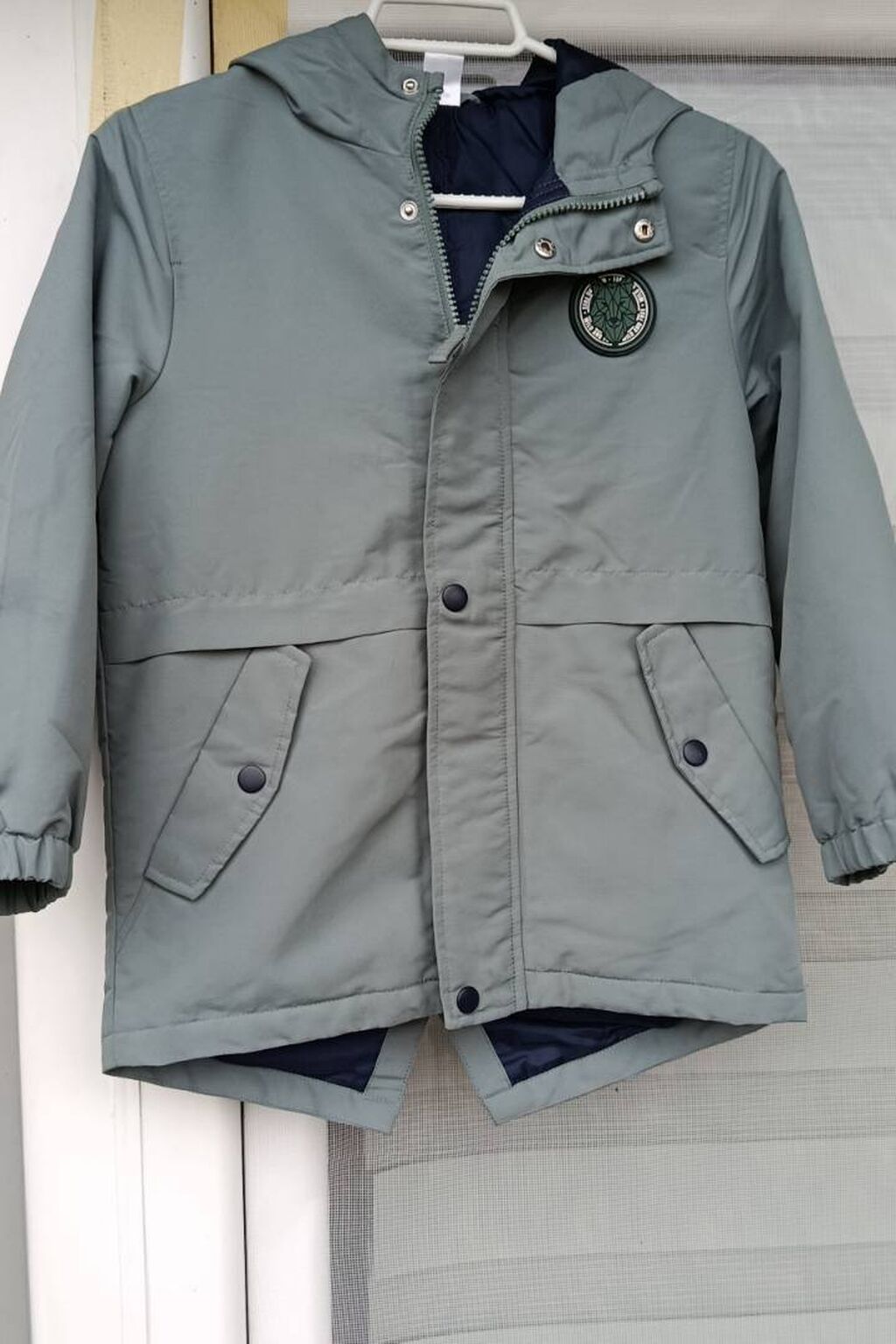 Dečja jakna sa kapuljačom, sivo-zelene boje. - Dupli kopčanje