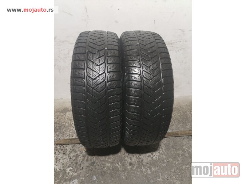 3424. Gume PIRELLI 16-ice, ZIMSKE 215/65, Šara 5,8 mm, DOT 4321