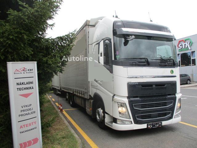 Volvo FH 500 kamion sa klizna zavesa cerada + prikolica sa kliznom ceradom