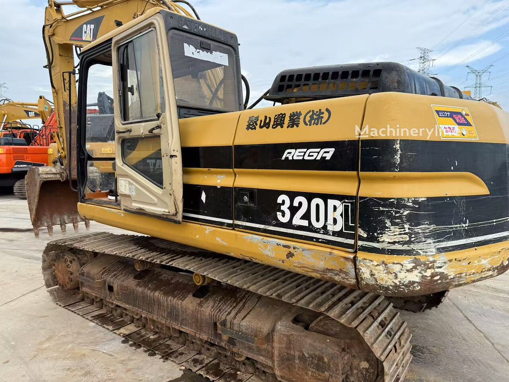 Caterpillar 320BL bager guseničar
