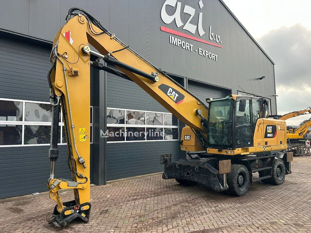 Caterpillar MH3022 bager za pretovar