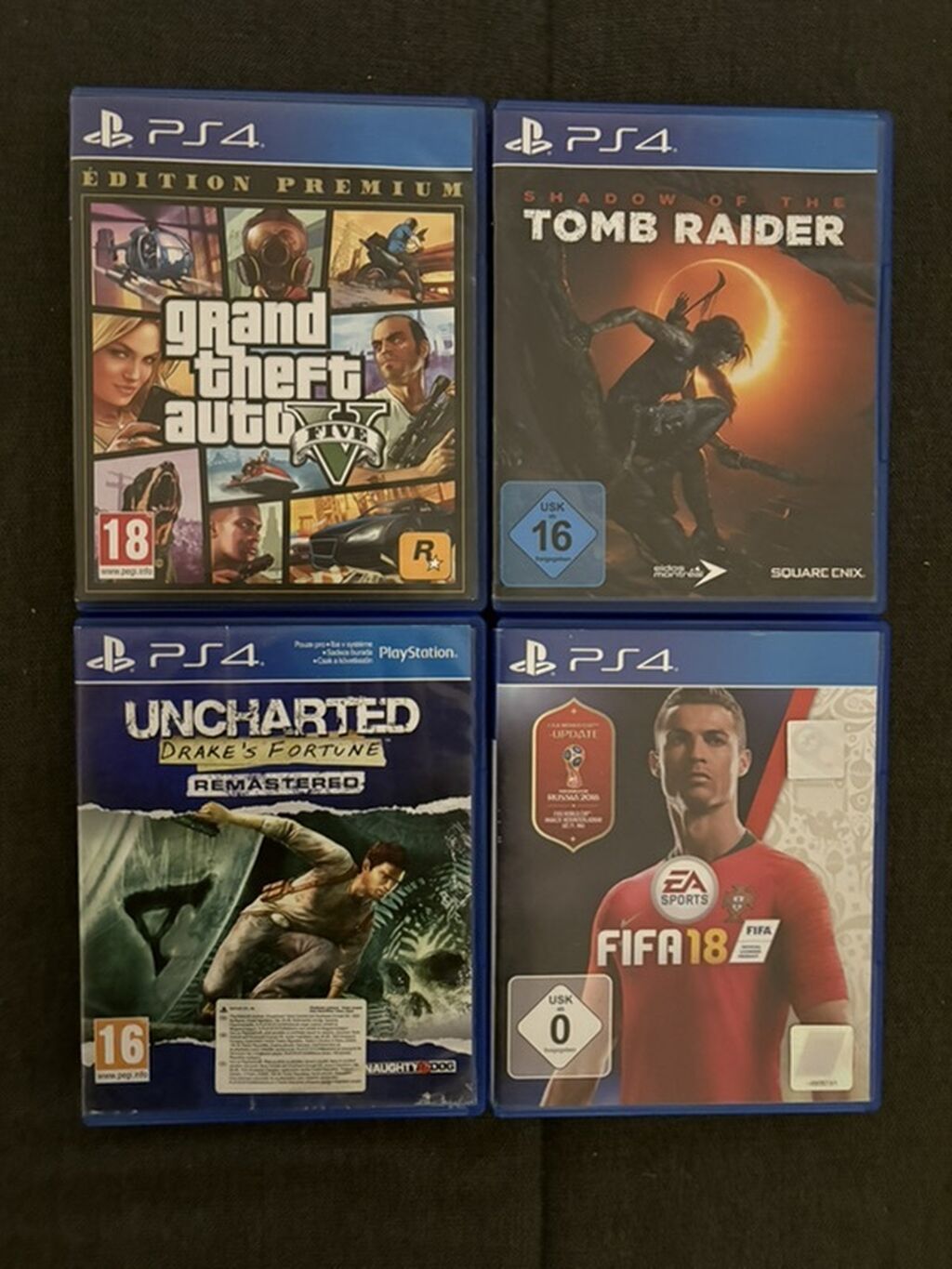PS4 igre – komplet od 4 naslova (fizičke kopije, Blu‑ray, sa kutijama