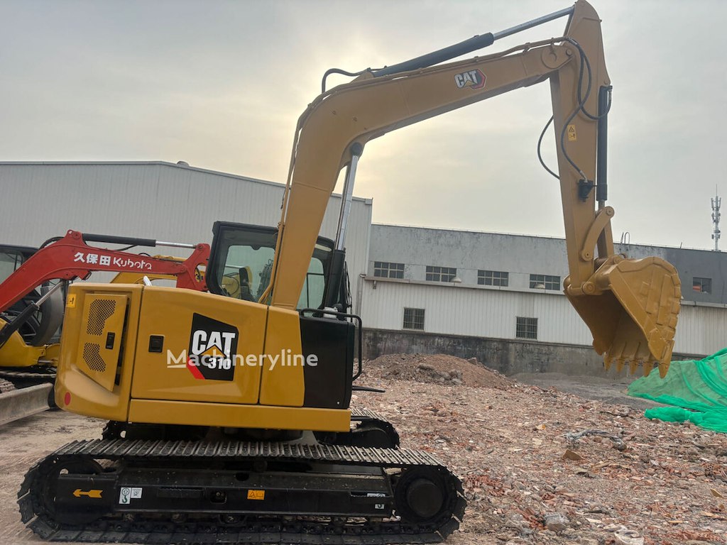Caterpillar 310 midi bager