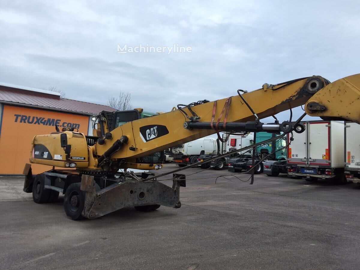 Caterpillar M322D MH bager za pretovar