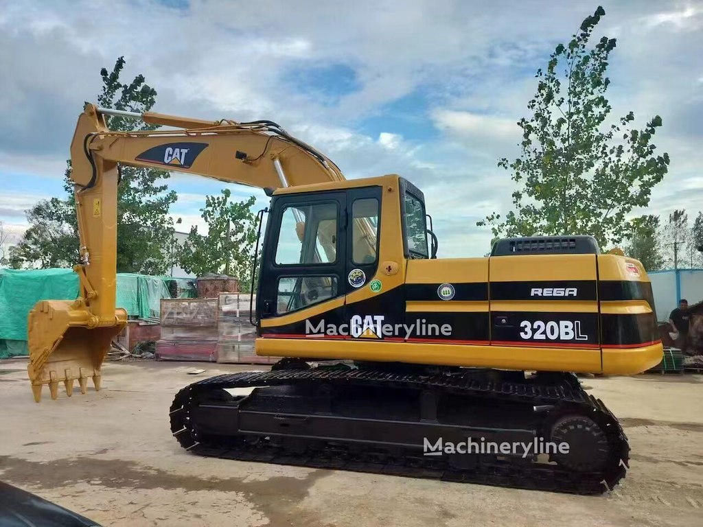 Caterpillar 320BL bager guseničar