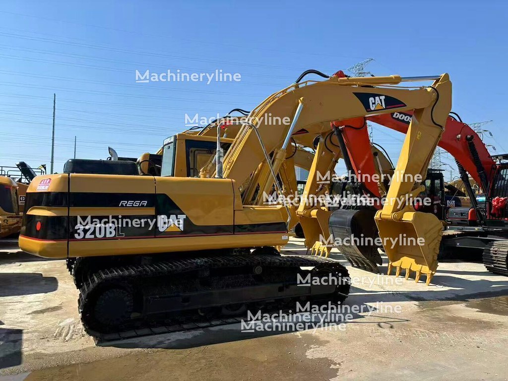 Caterpillar 320BL bager guseničar