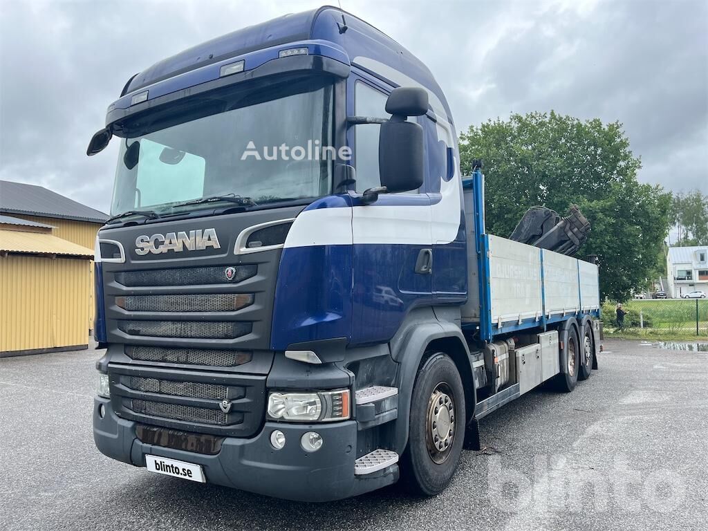 Prodaje se Scania R580LB6X2HNB kamion s ravnom platformom na aukciji