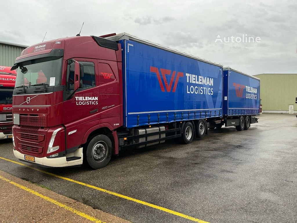 Prodaje se Volvo Combikavel vrachtwagen met aanhangwagen kavel 27 en kavel 99 (C) kamion s ceradom na aukciji
