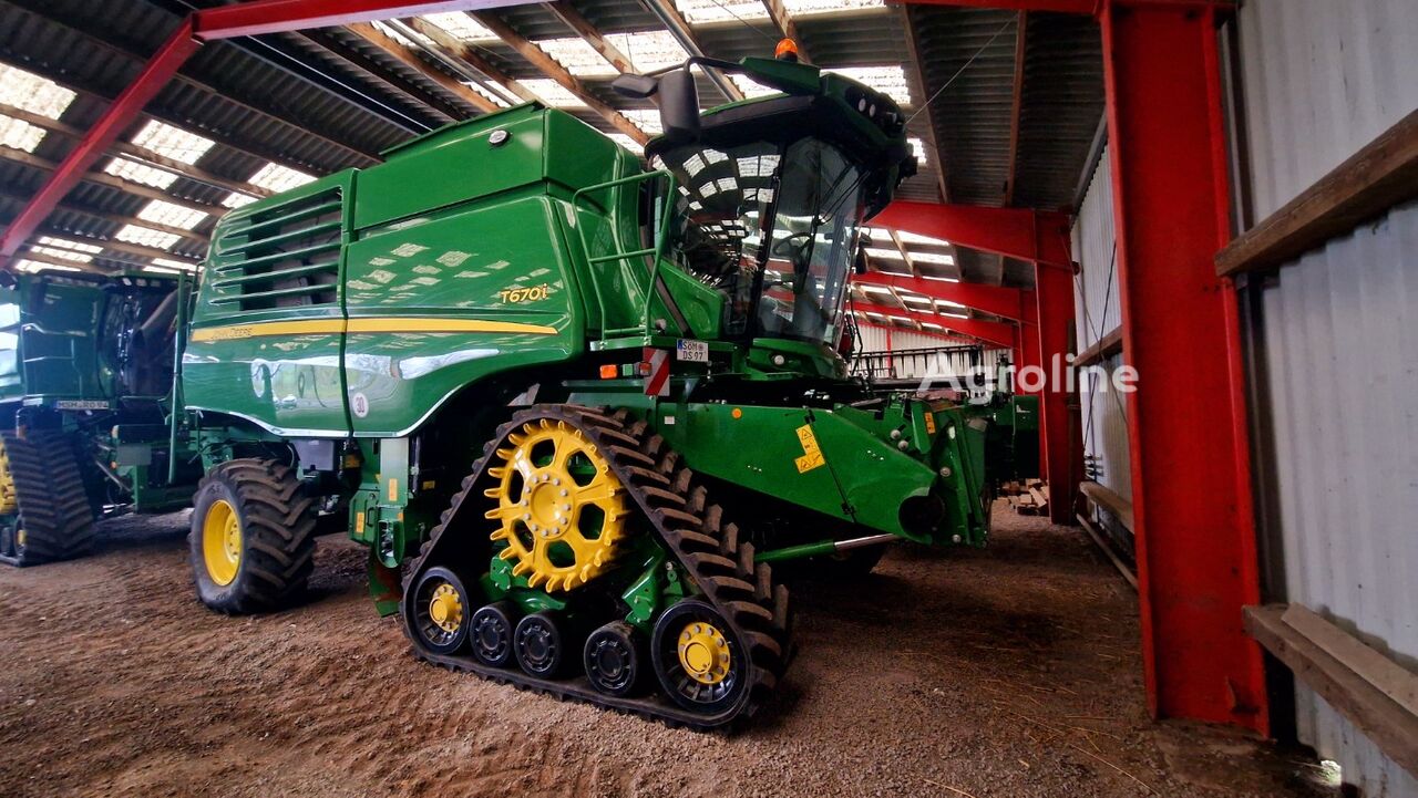 John Deere T670 Raupe mit 730FD kombajn za žito