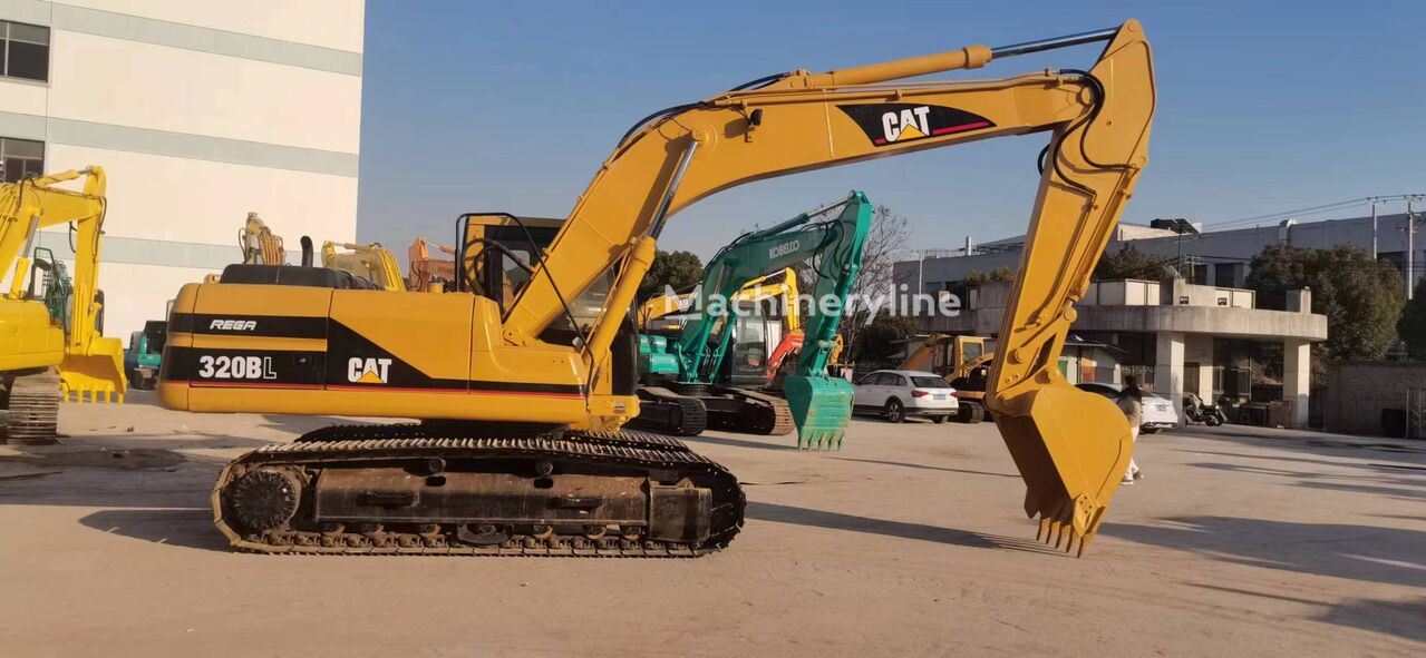 Caterpillar 320BL bager guseničar