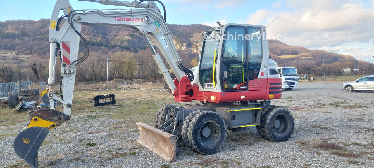 Takeuchi TB295W bager točkaš