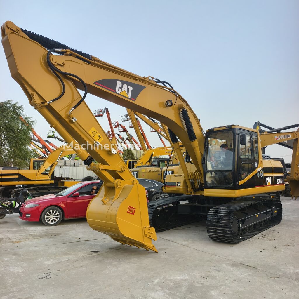 Caterpillar 320BL bager guseničar
