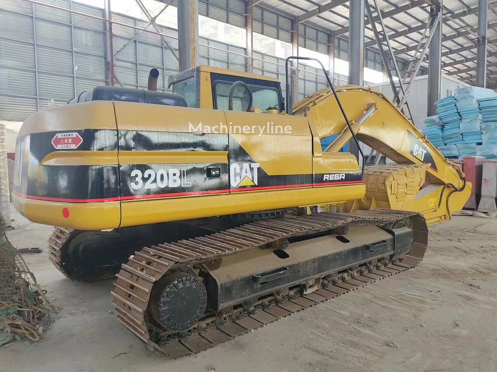 Caterpillar 320BL bager guseničar