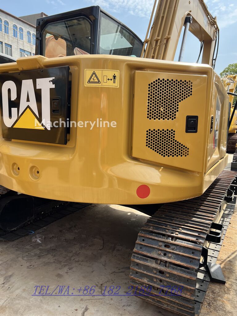 Caterpillar 310 bager guseničar