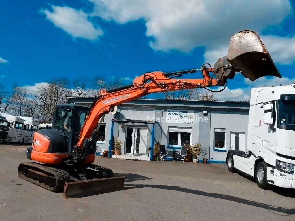 Kubota KX057-4 bager-utovarivač