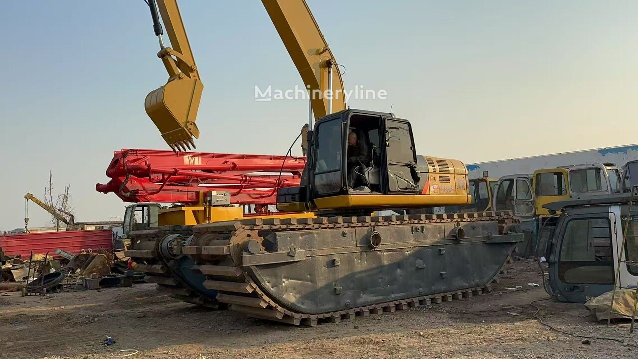 Caterpillar 320CL bager amfibija