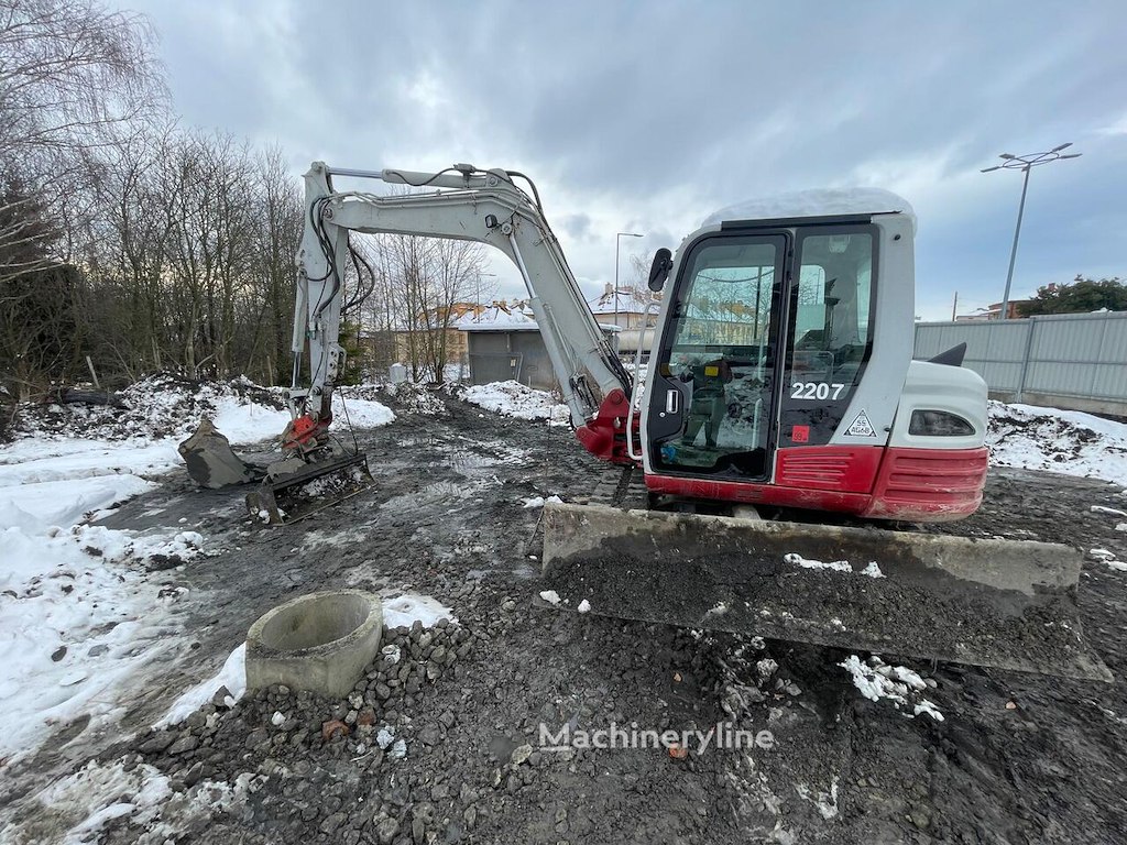 Takeuchi TB285 midi bager