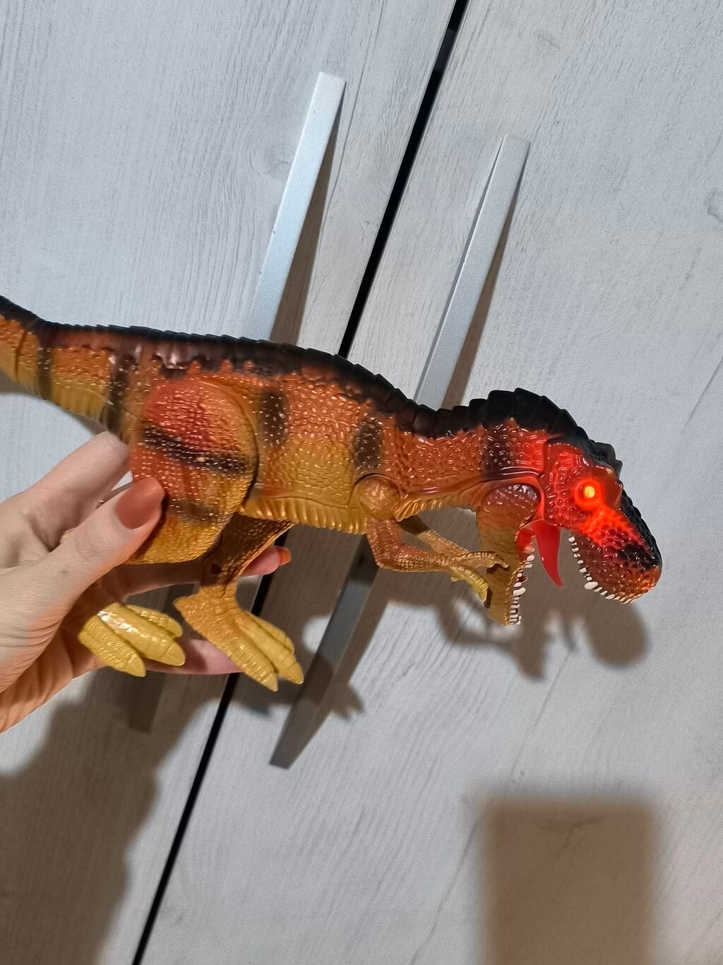 Interaktivna igračka dinosaur – T‑Rex sa svetlećim efektima -