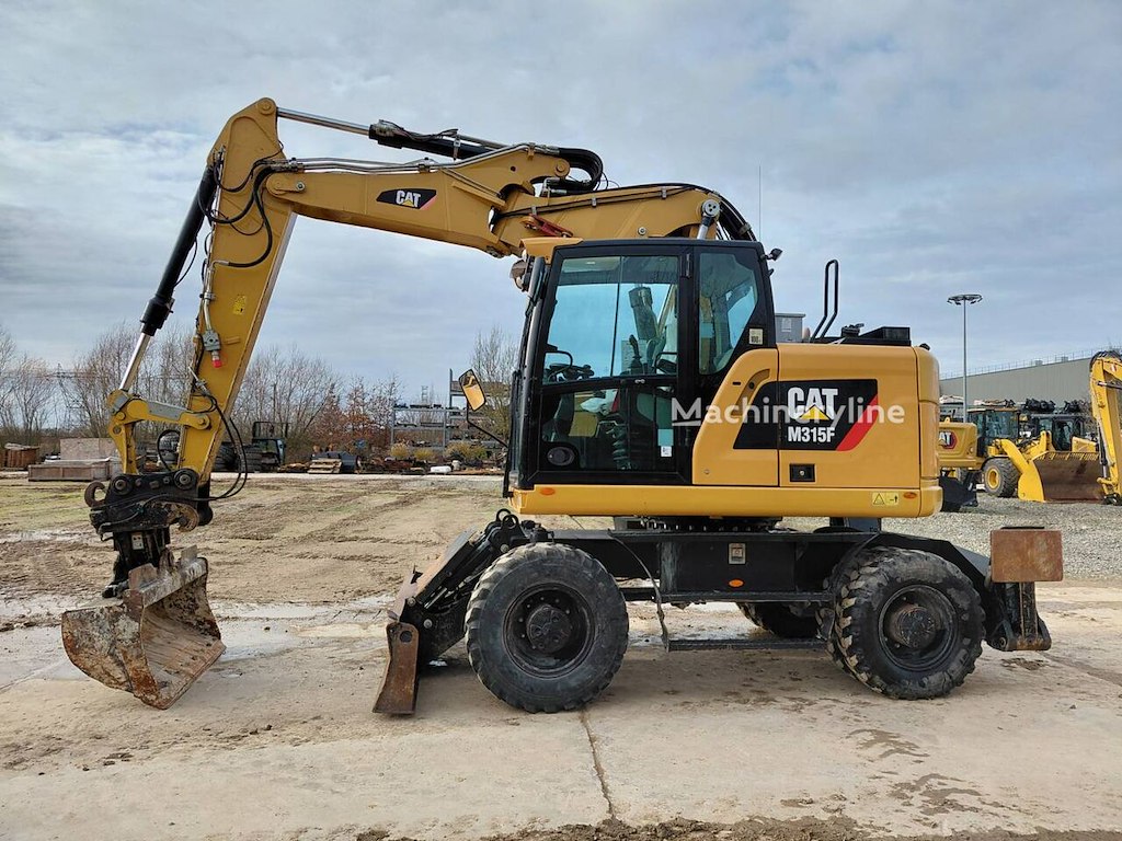 Caterpillar M315F IVC bager točkaš
