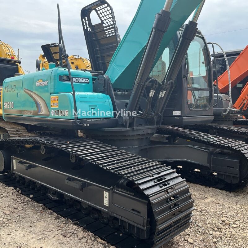 Kobelco SK210 bager guseničar