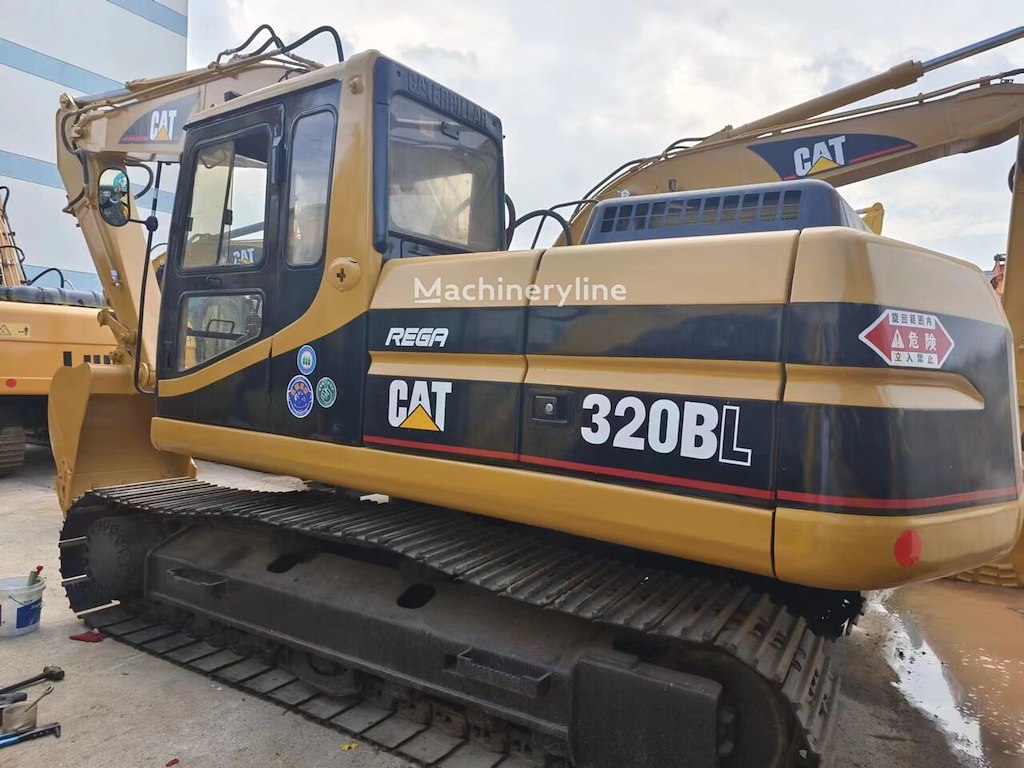 Caterpillar 320BL bager guseničar