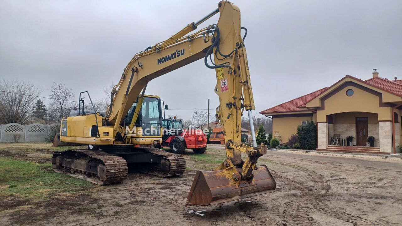 Komatsu PC 210 bager guseničar