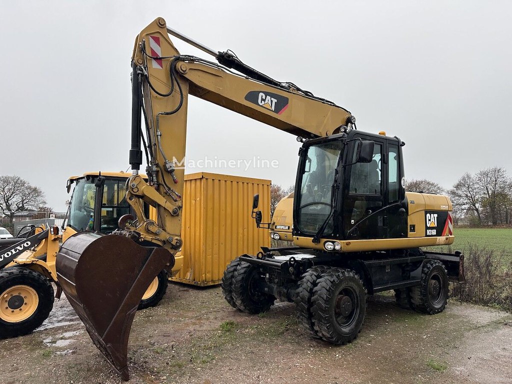 Caterpillar M 316 D bager točkaš