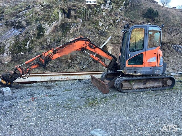 Bager za puzanje
Doosan DX62R-3 excavator w/ rototilt, sanding bucket and
