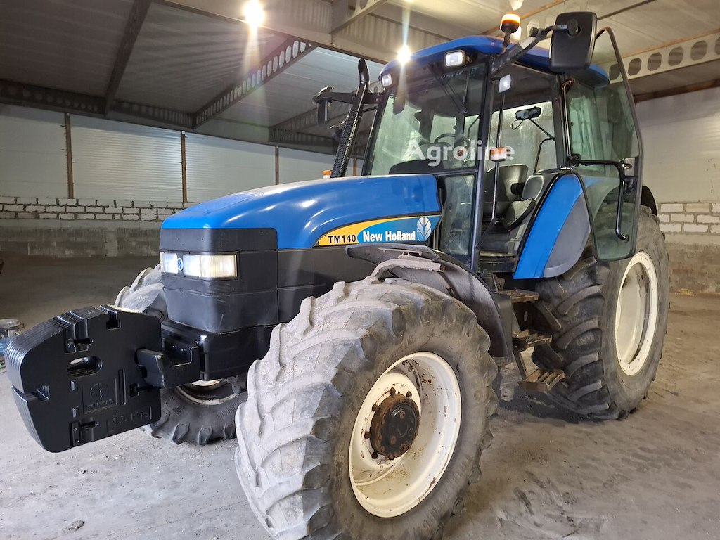 New Holland Tm 140 traktor točkaš