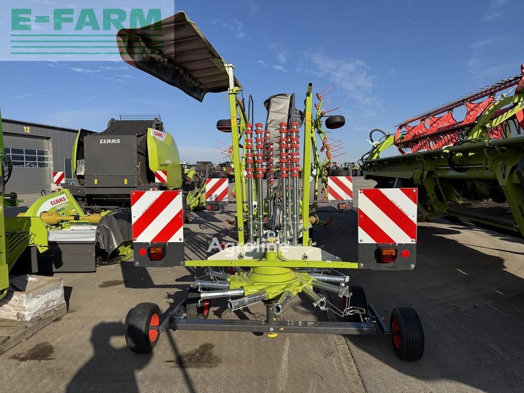 Claas liner 450 prevrtač sena