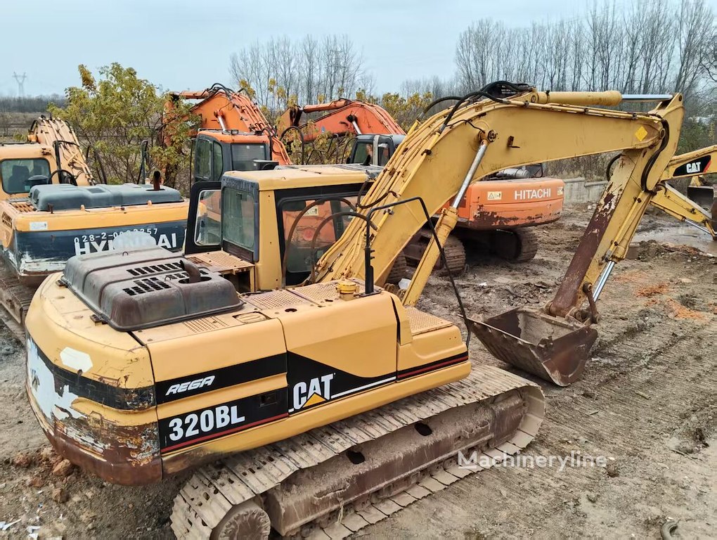Caterpillar 320BL bager guseničar