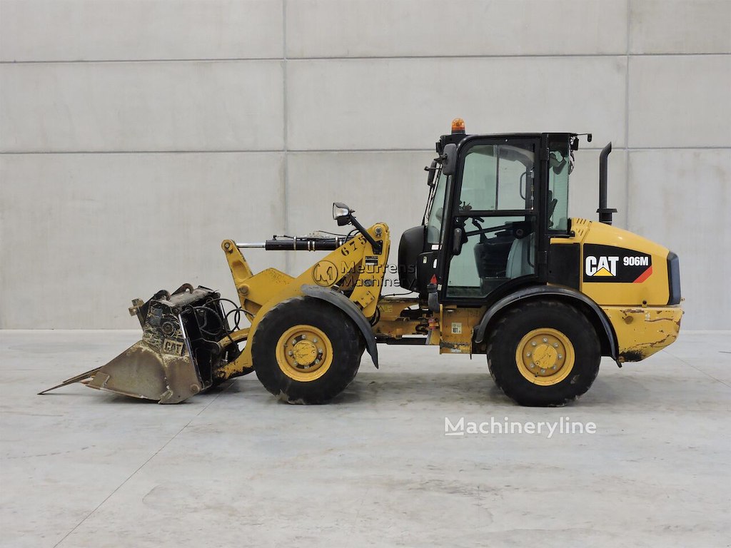 Caterpillar 906 prednji utovarivač