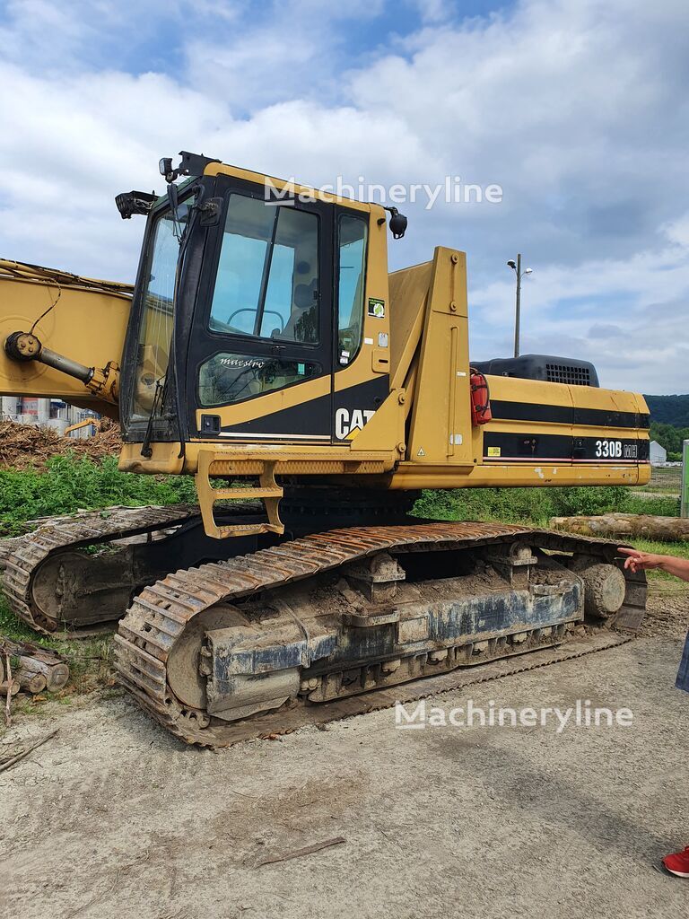 Caterpillar 330 BL bager za pretovar