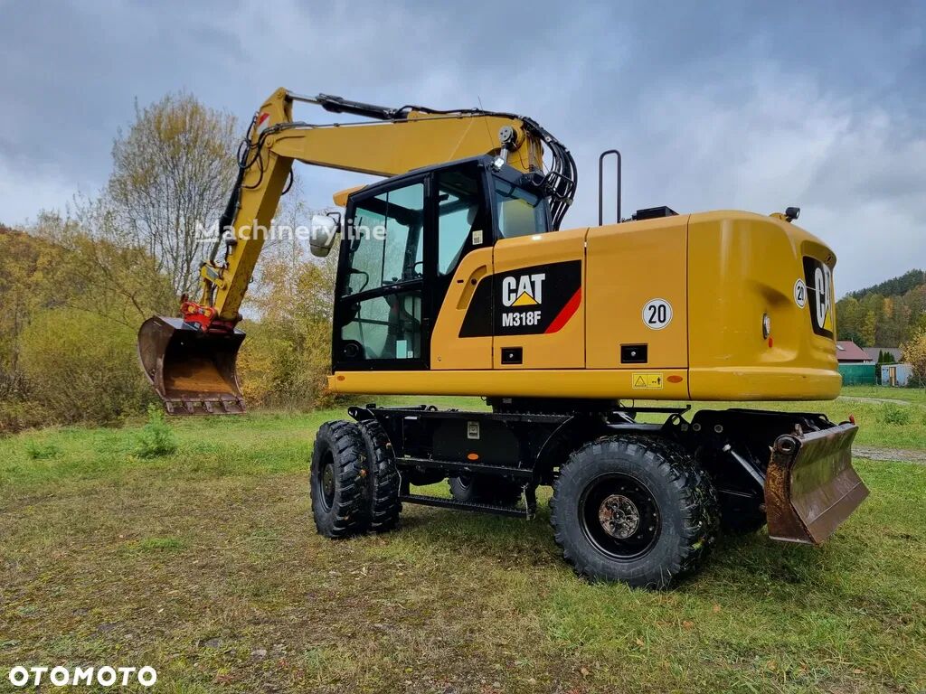 Caterpillar M318F bager točkaš