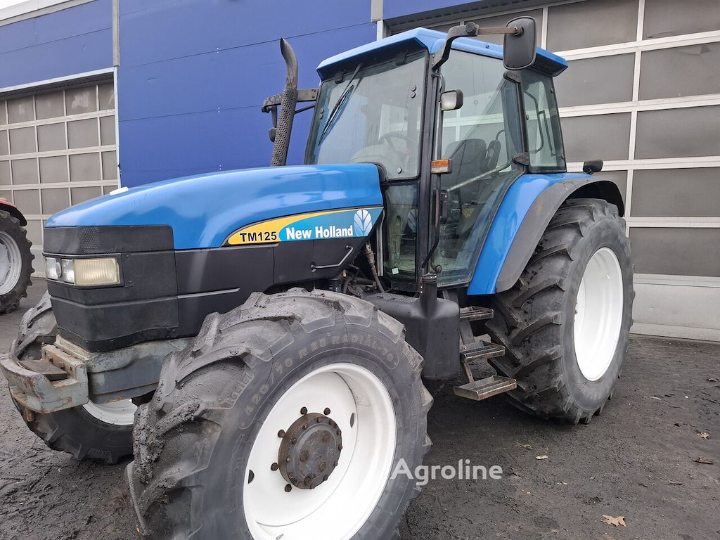 New Holland TM 125 traktor točkaš