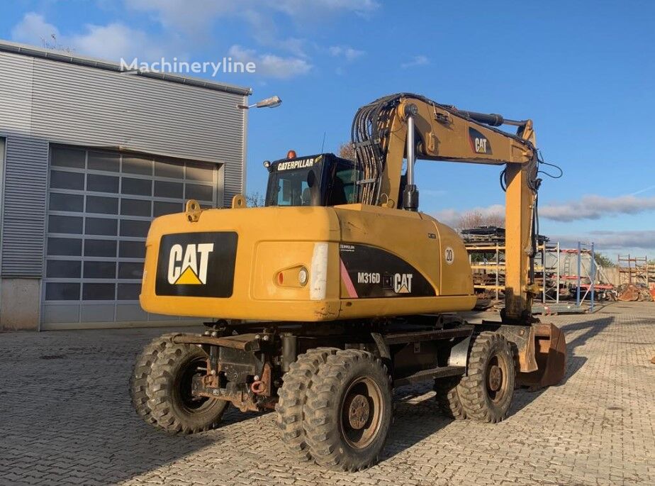 Caterpillar 316 bager točkaš