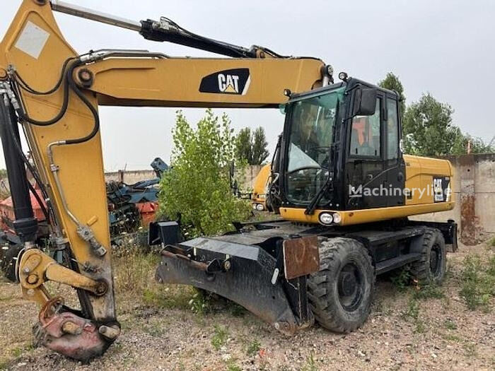 Caterpillar M322D bager točkaš