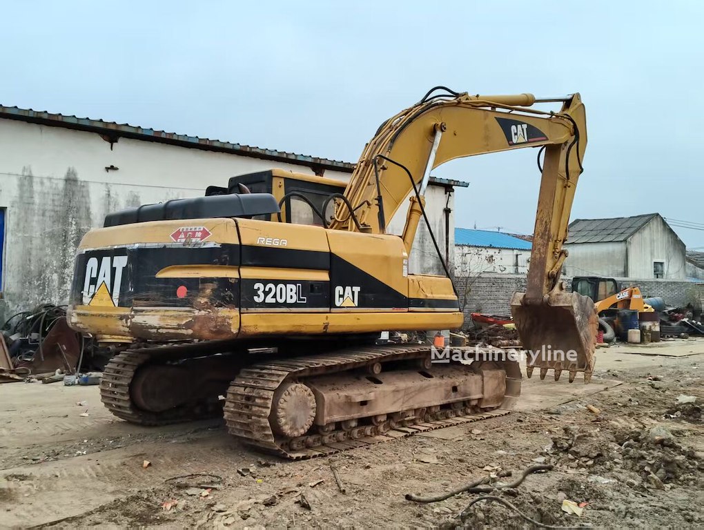 Caterpillar 320BL bager guseničar