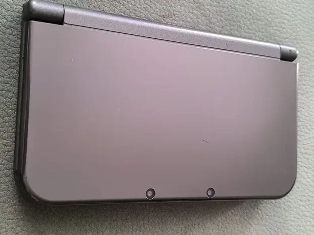 Prodajem NEW Nintendo 3DS XL konzolu (poslednji i najjaci model) U