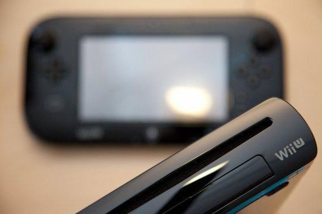    SNIŽENO – Nintendo Wii U 32GB (crna) + 128GB SD + igre Prodajem crnu