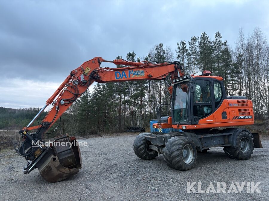 Prodaje se Doosan DX140W mini bager na aukciji