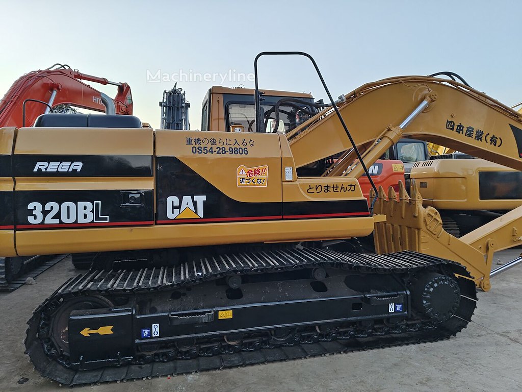 Caterpillar 320BL bager guseničar