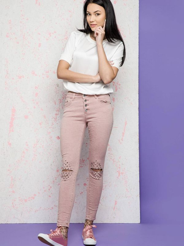 EUPHORA JEANS DECORATED WITH CUTS AND RHINESTONES ON THE KNEES PINK