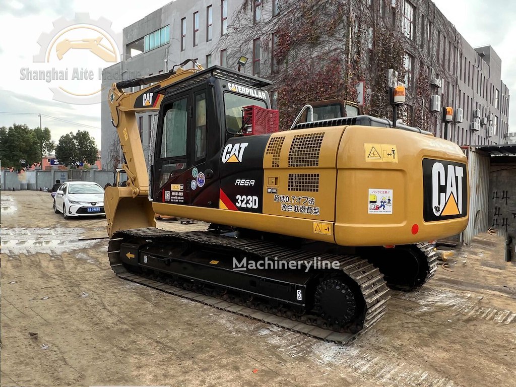 Caterpillar 323 bager guseničar