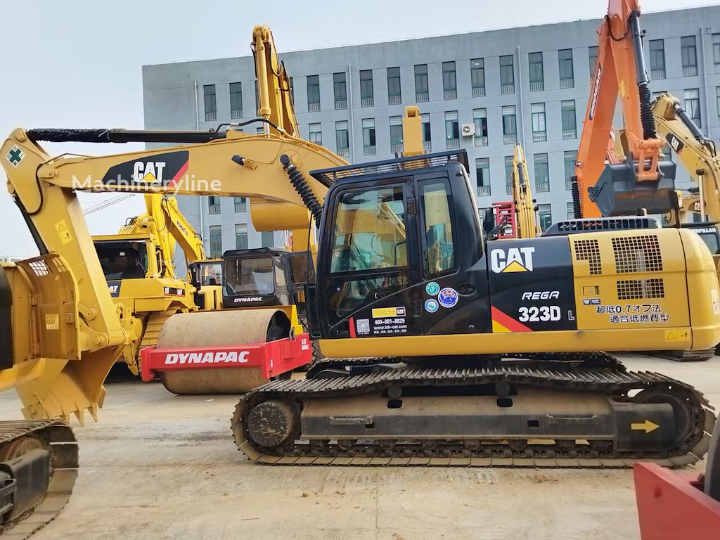 Caterpillar 323 bager guseničar