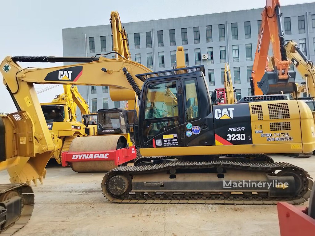 Caterpillar 323 bager guseničar