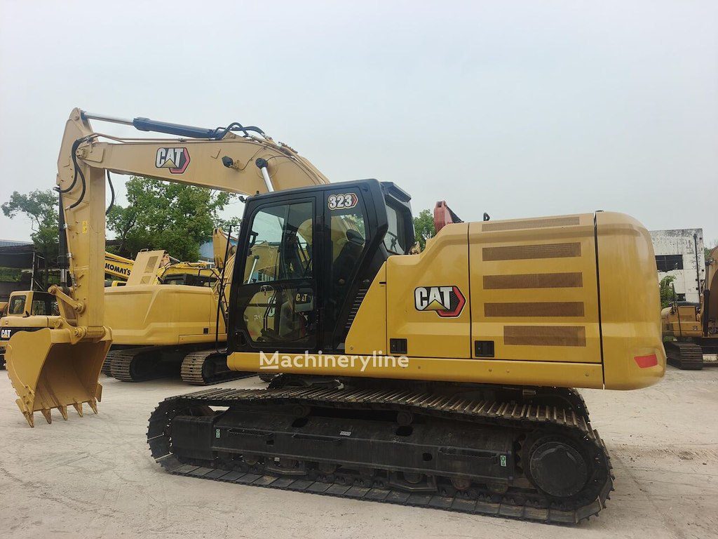 Caterpillar 323 bager guseničar