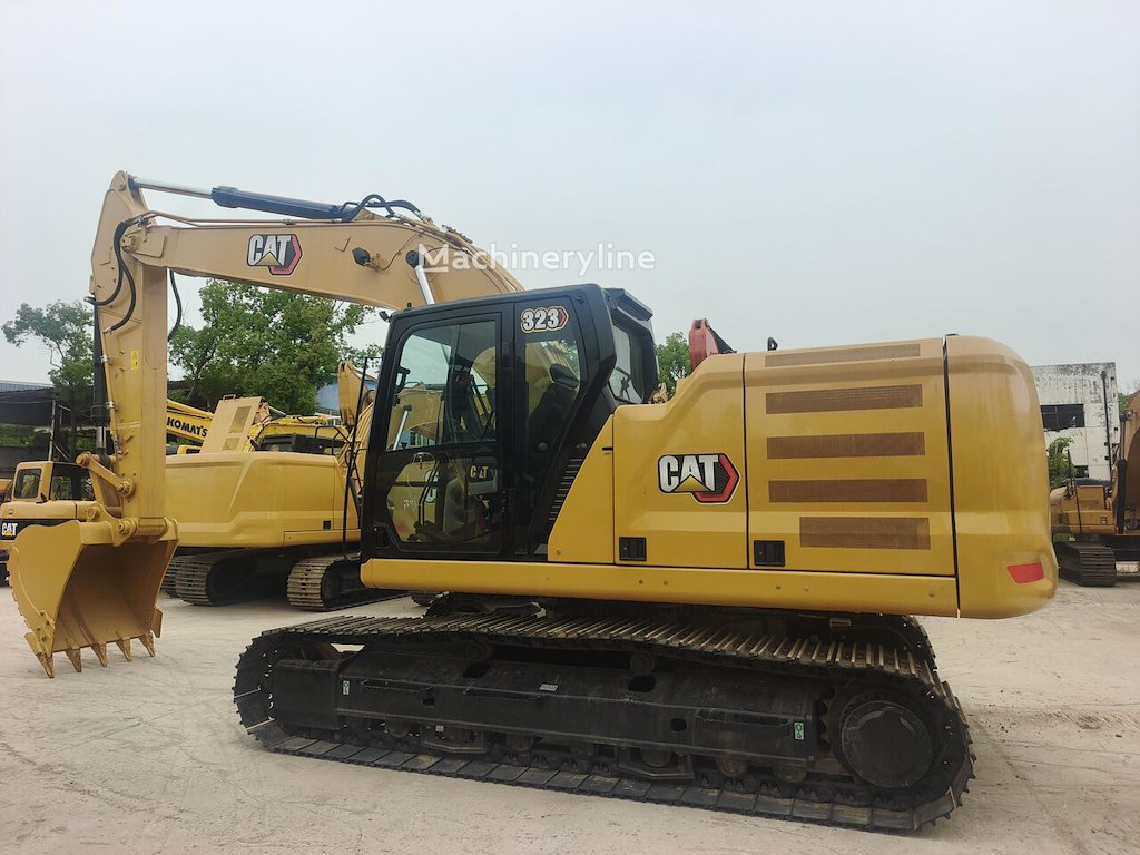 Caterpillar 323 bager guseničar